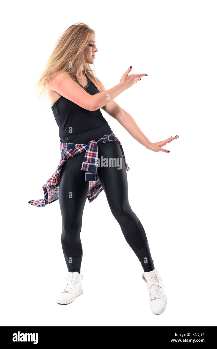 Profile view of modern female dancer performance motion dancing jazz ...