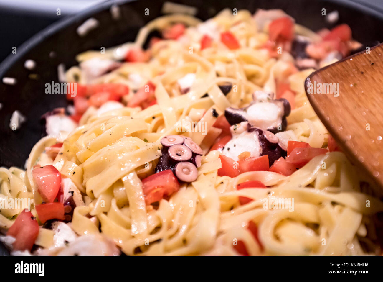 Seafood pasta with octopus Stock Photo - Alamy