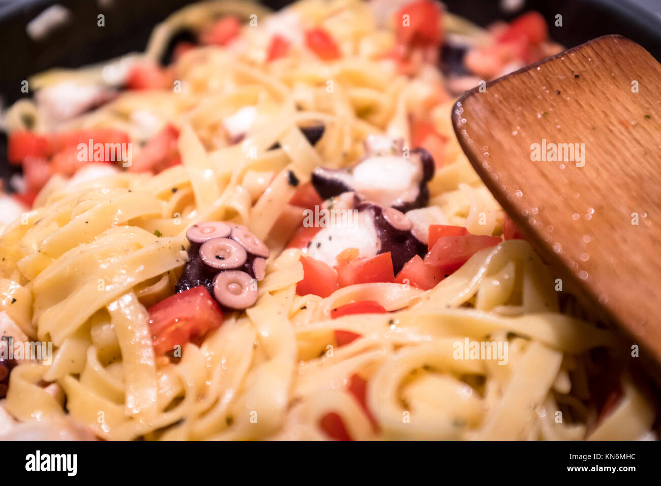 Seafood pasta with octopus Stock Photo - Alamy