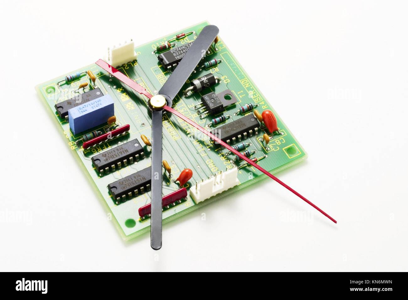 Circuit Board with Clock Hands Stock Photo - Alamy