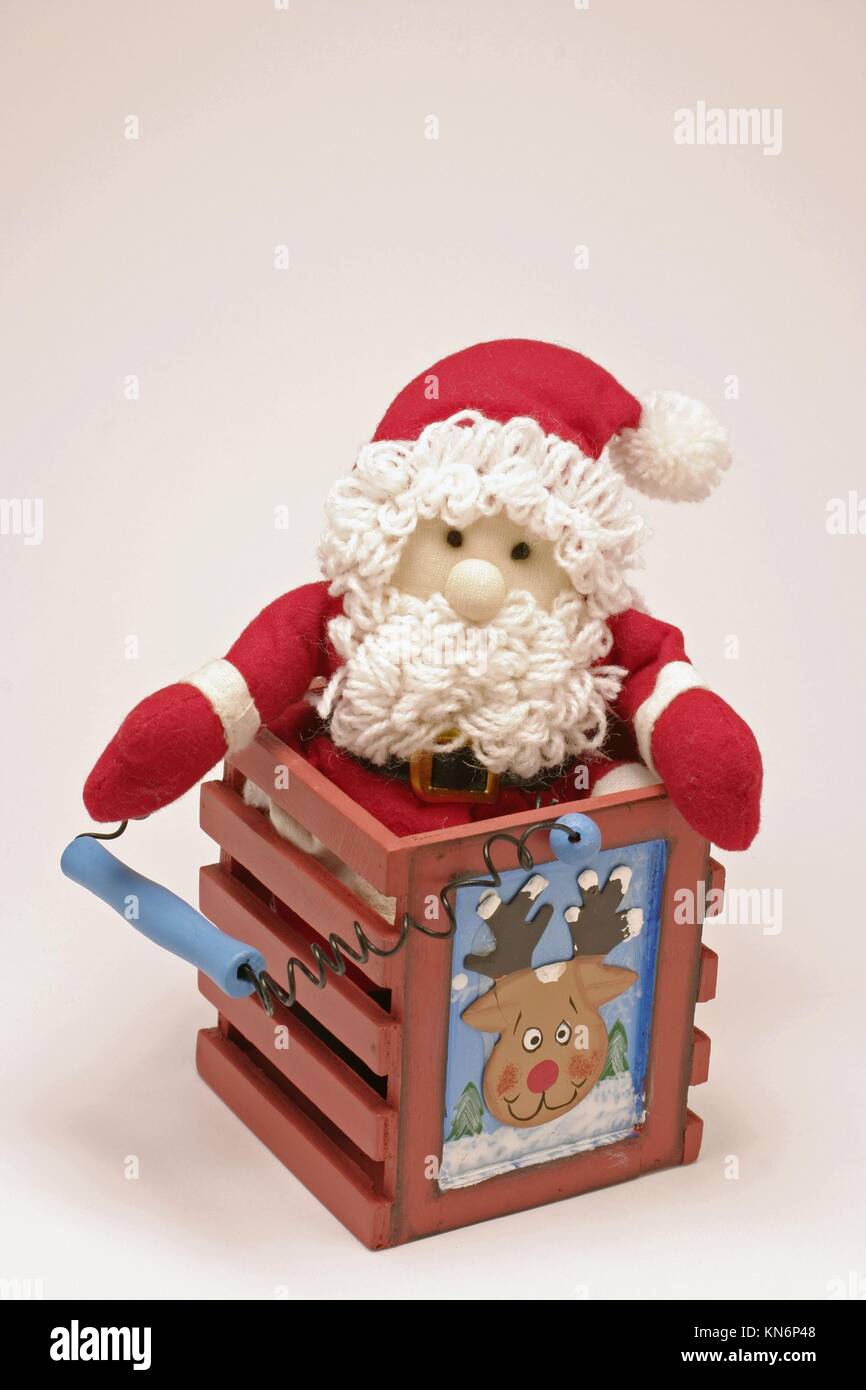 Santa Claus in toy box Stock Photo - Alamy
