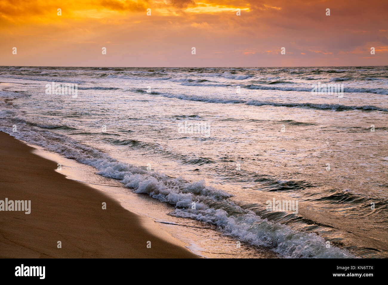 Purple sunrise over sea Stock Photo - Alamy