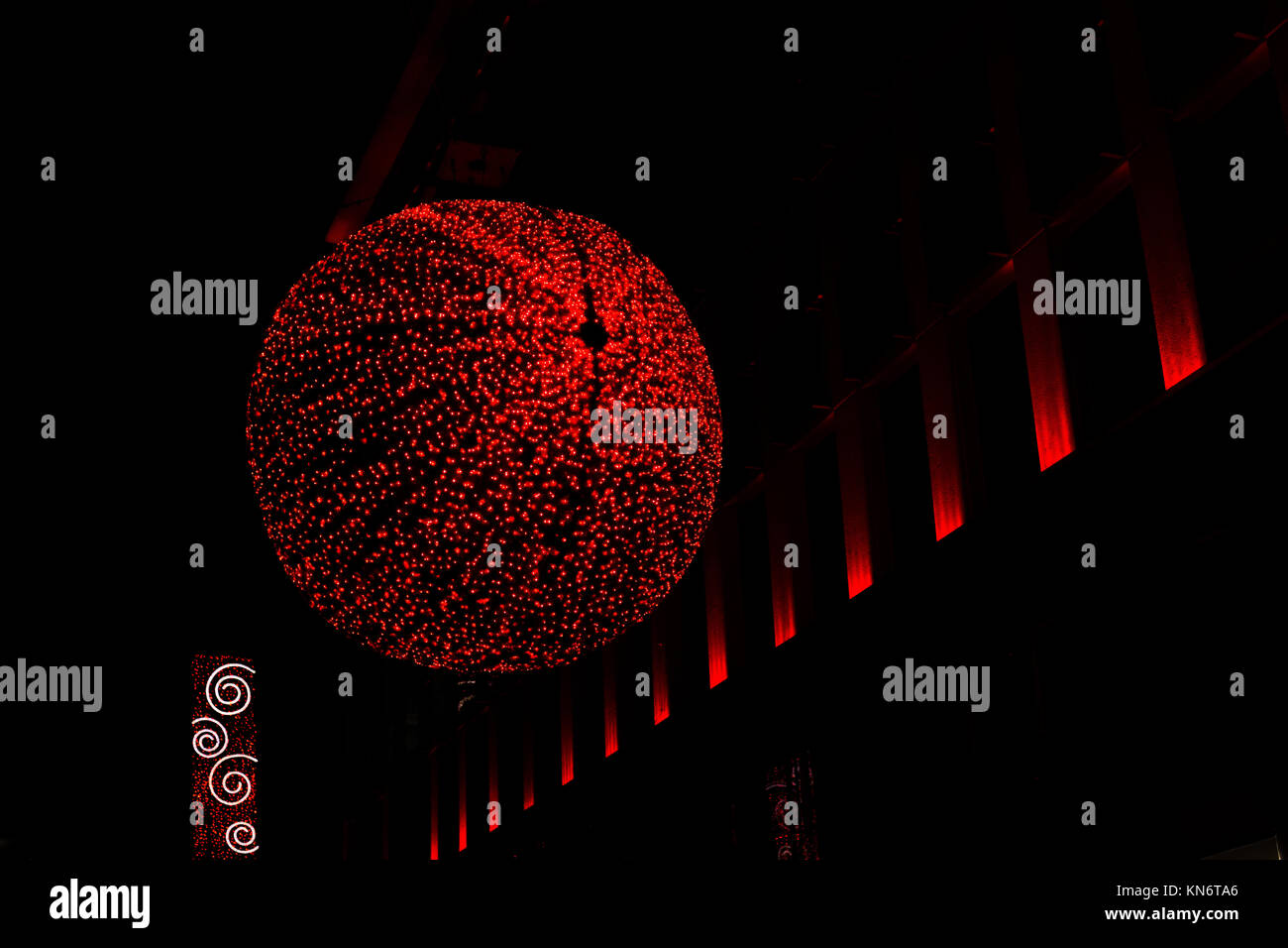 Festival lights at night Big red lighted ball street decoration for ...