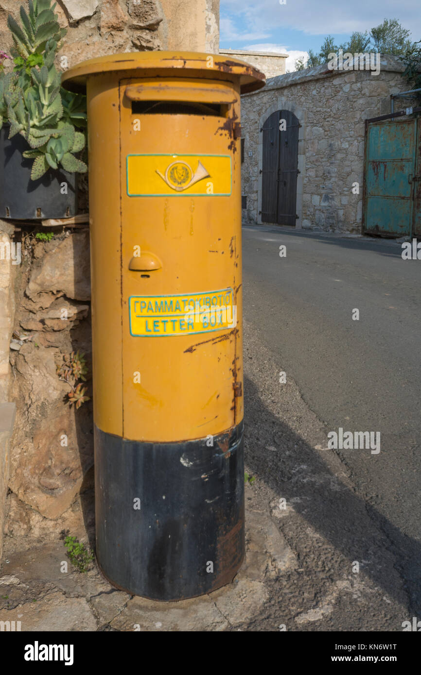 Orange letterbox in the village of Neo Chorio in Cyprus Stock Photo - Alamy