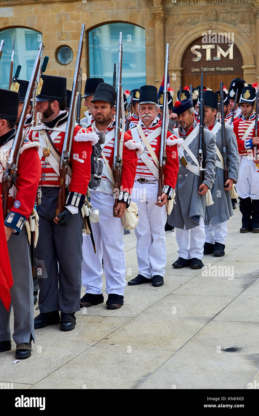 Soldiers stand in formation during Tamborrada, the drum parade to ...
