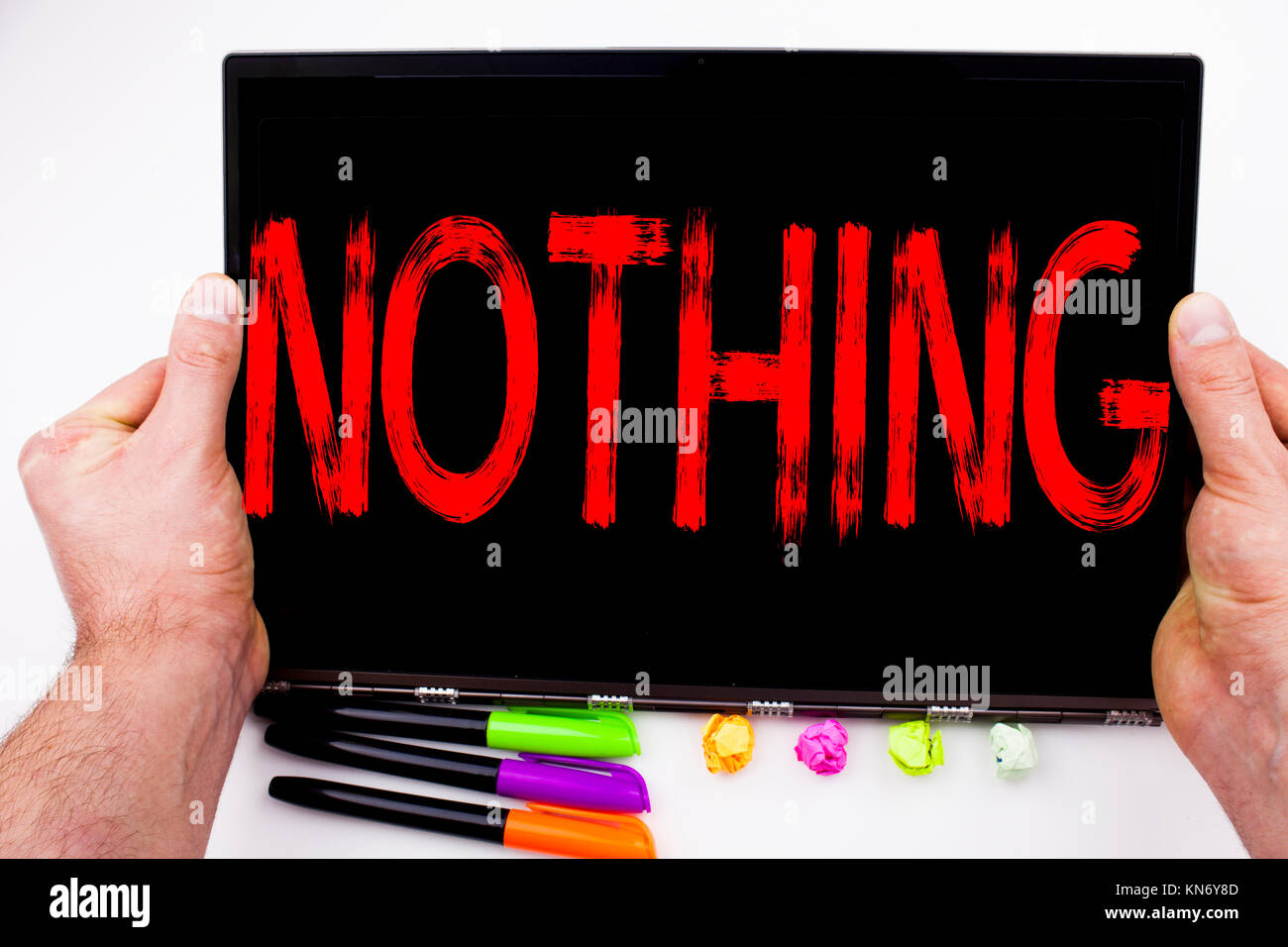 Nothing text written on tablet, computer in the office with marker, pen ...