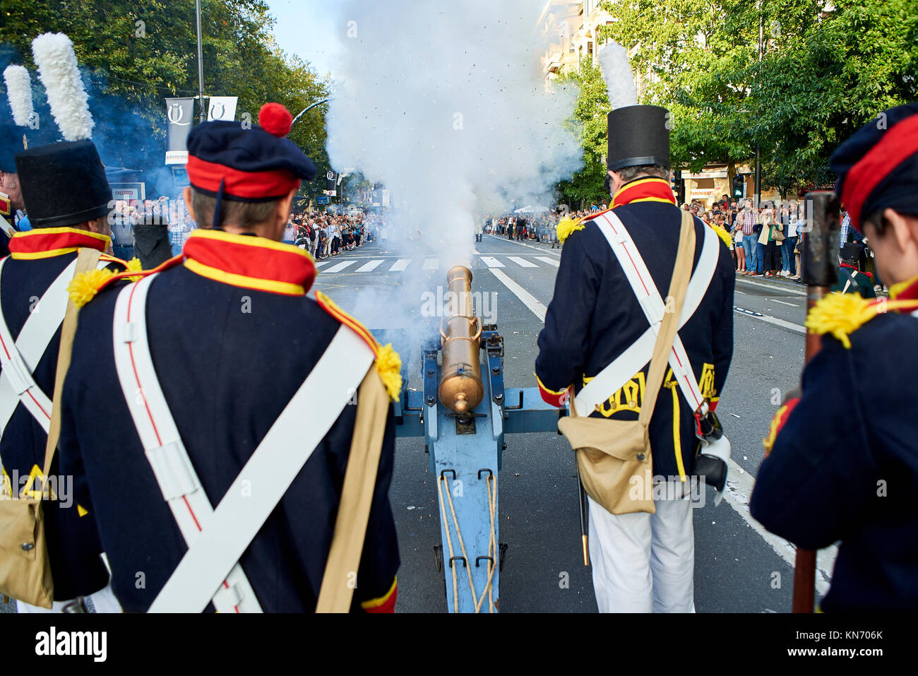 Soldiers firing a cannon during Tamborrada, the drum parade to ...