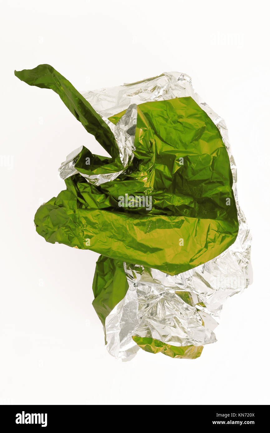 Crumpled wrapping paper ball falling on white surface Stock Photo - Alamy