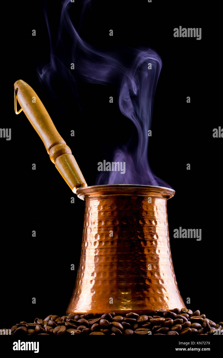 Turka with fragrant coffee on a dark background Stock Photo - Alamy