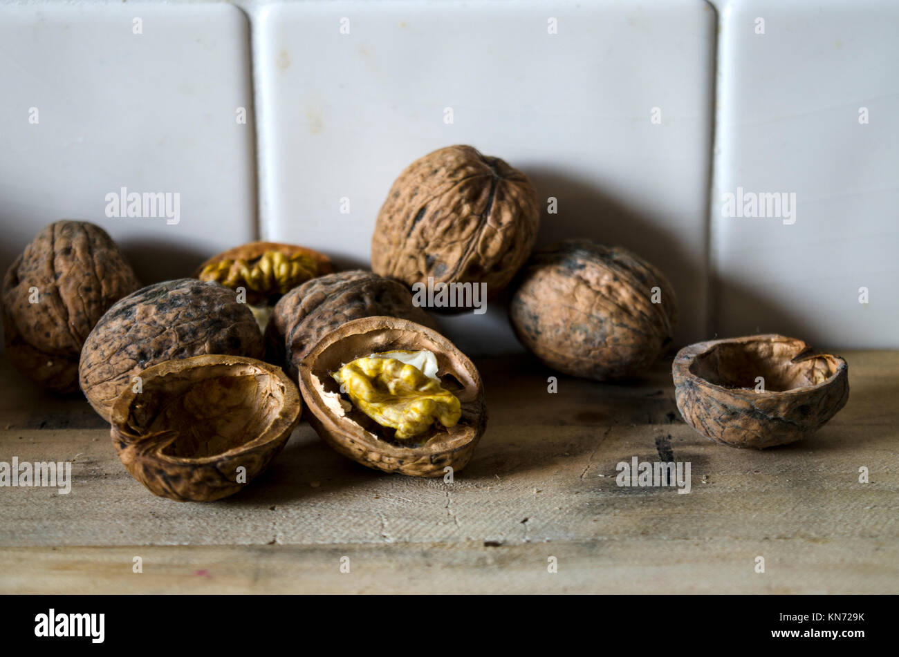 Walnuts in their Shells on White Background Stock Photo - Alamy