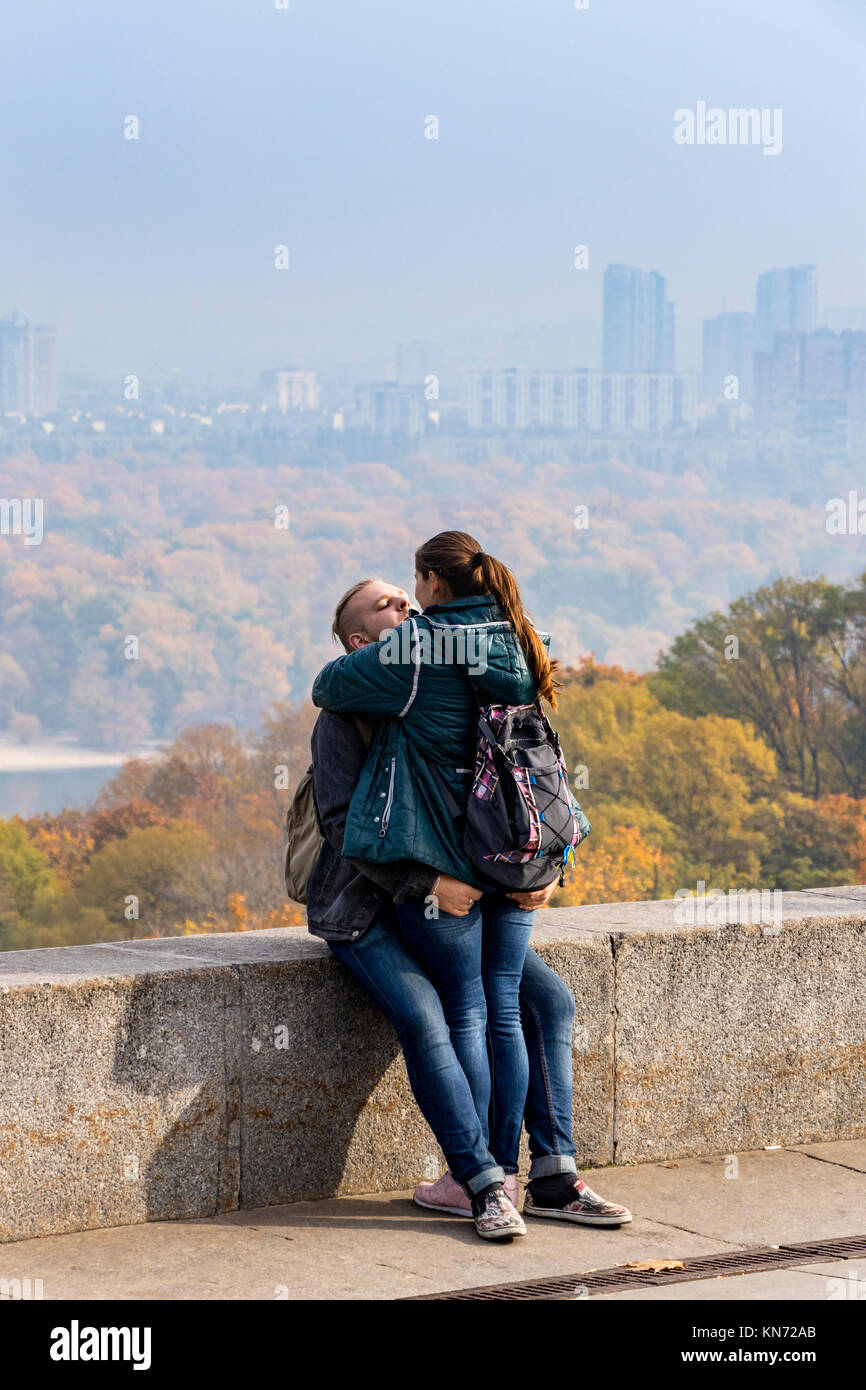 guy and girl hugging against city background Kiev ukraine 10,10,2017 ...