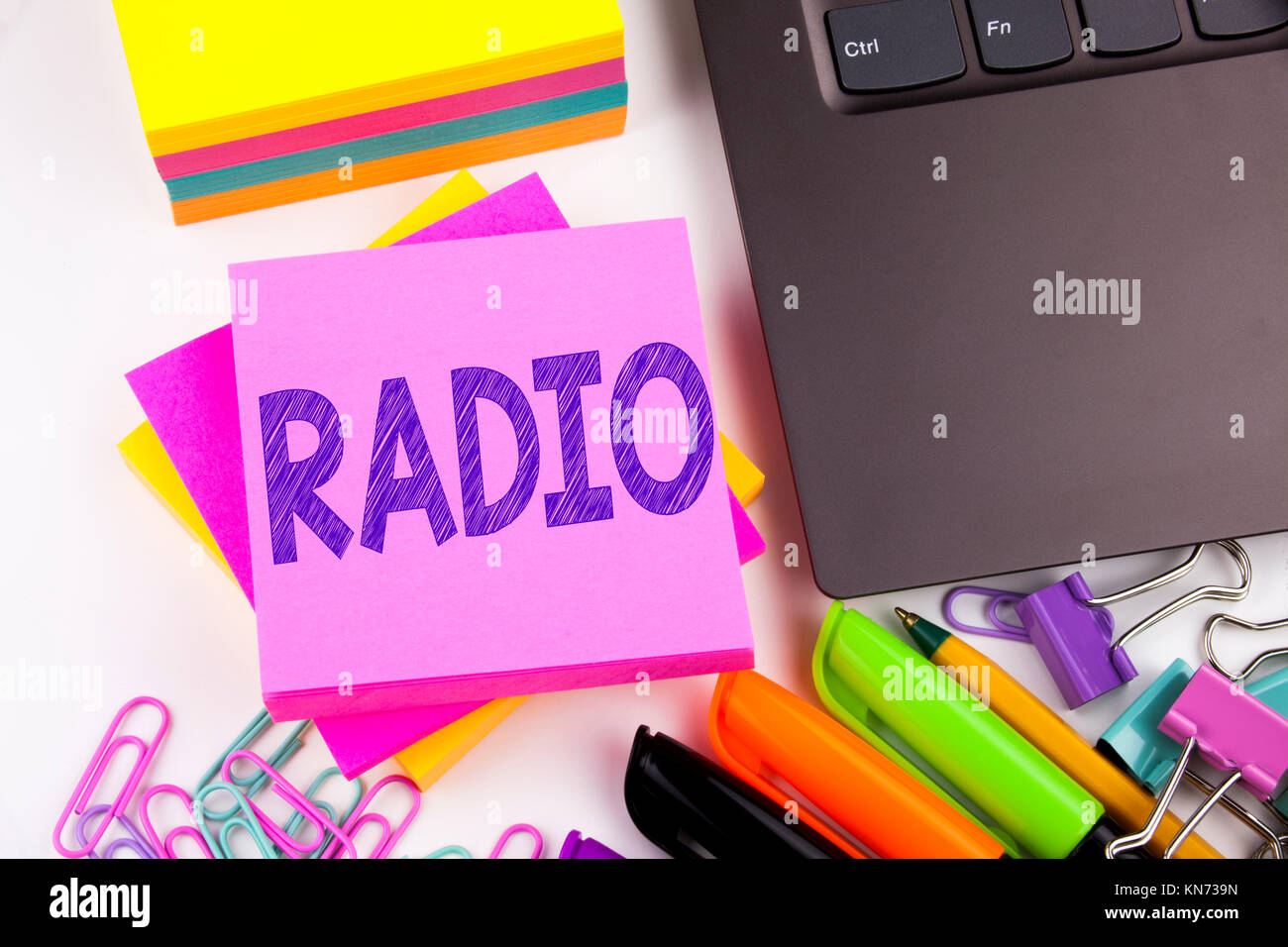 Writing text showing Radio made in the office with surroundings such as ...