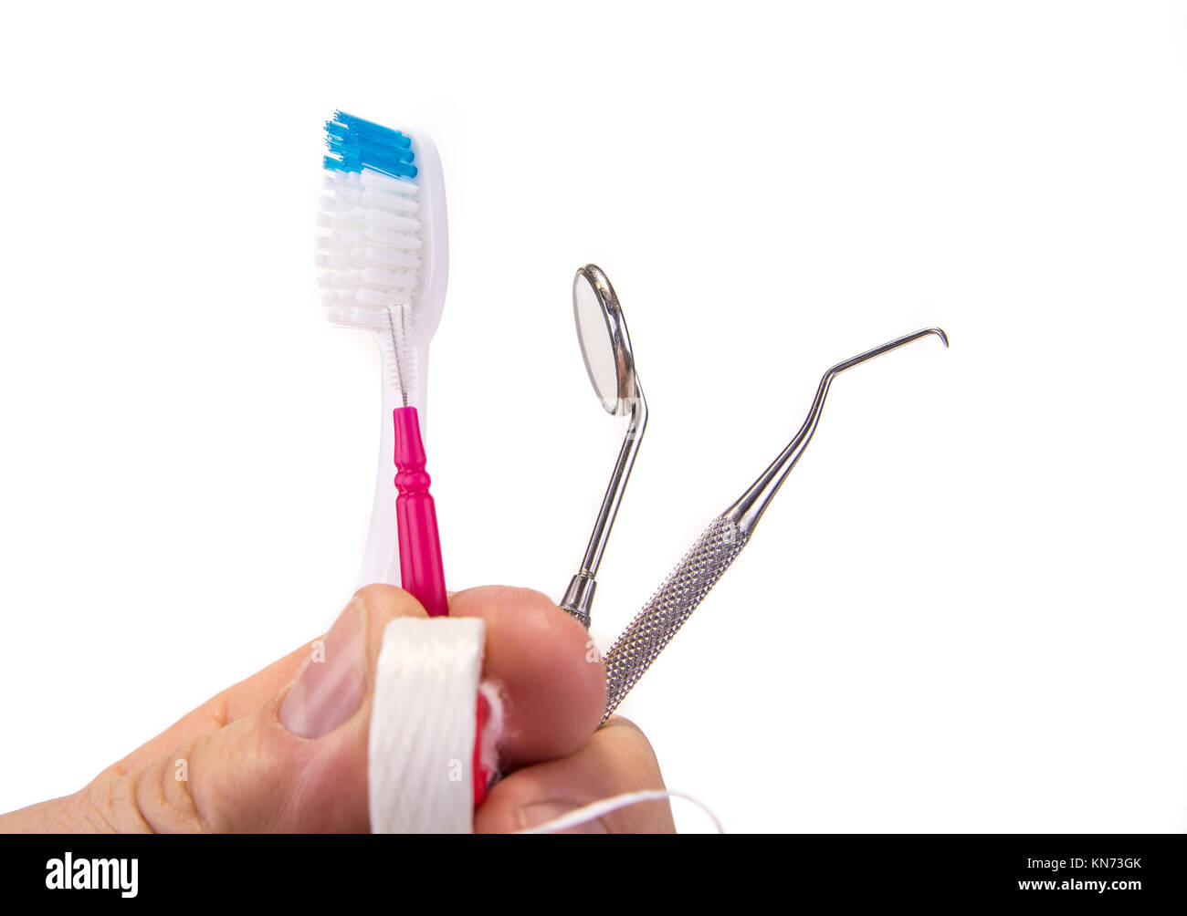 Dental tools with toothbrush interdental pick and floss Stock Photo - Alamy