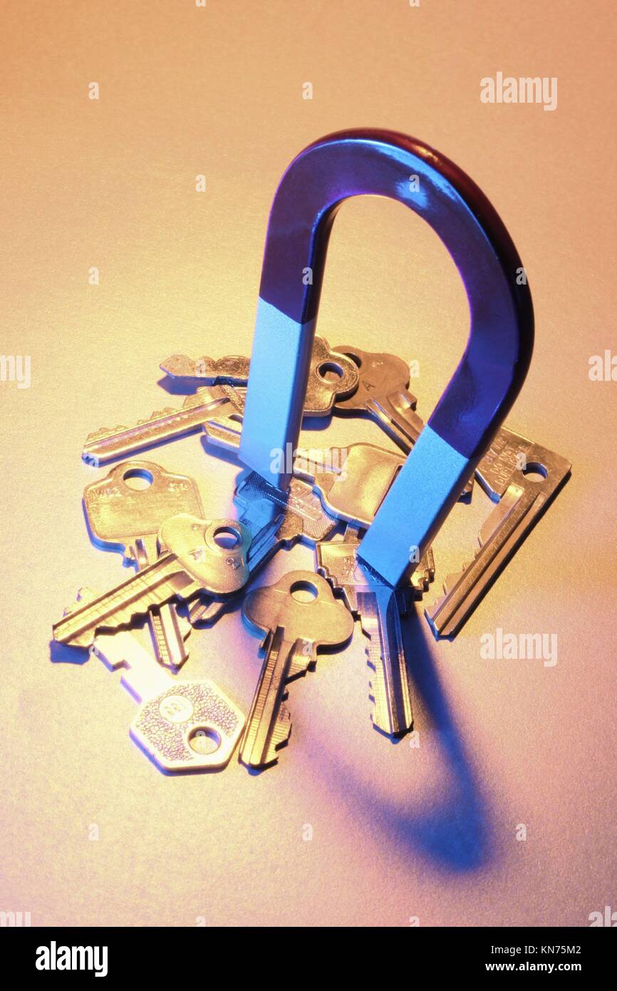 Magnet and keys Stock Photo - Alamy
