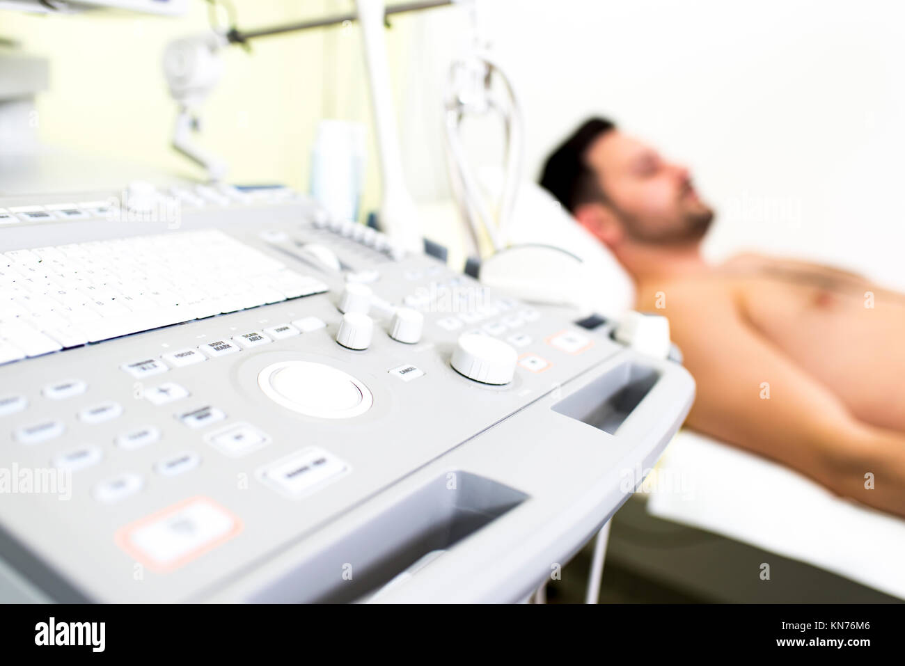 Young male patient in the ultrasound examination at hospital Stock ...