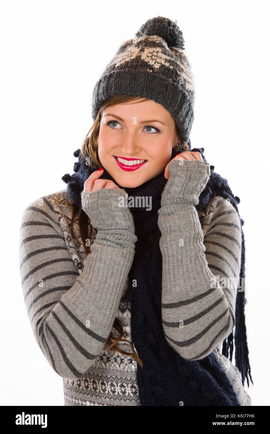 Beautiful young woman wearing woolen outfit, white background and ...
