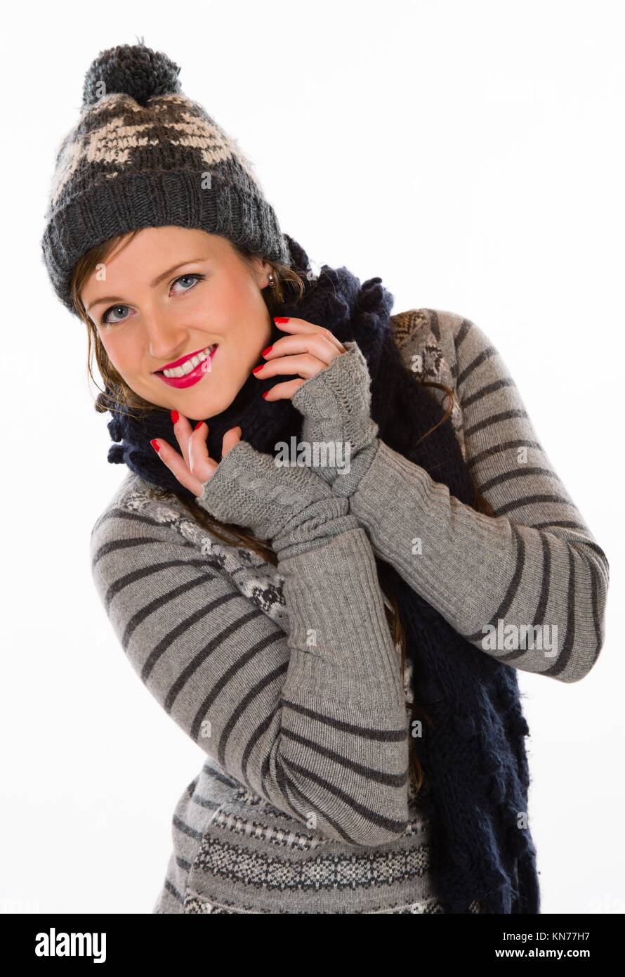 Beautiful young woman wearing woolen outfit, white background and ...