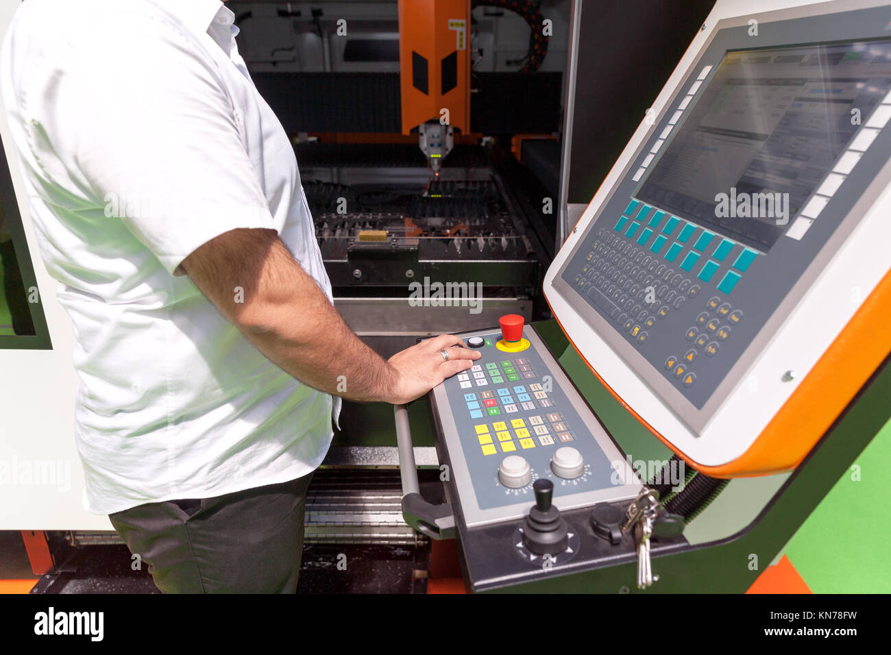 Hand on the control panel of a programmable machine Stock Photo - Alamy