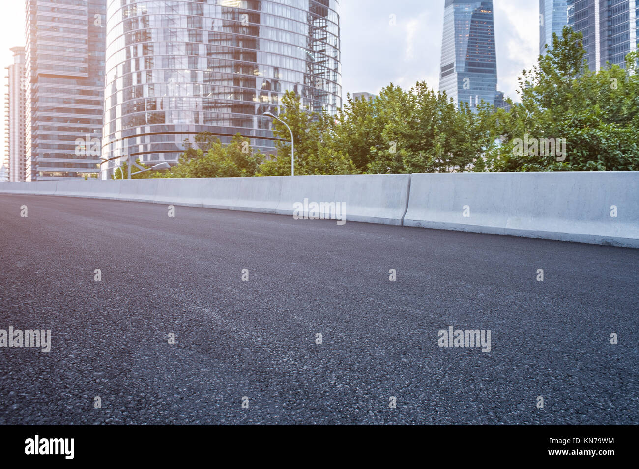 empty asphalt road through modern city in China Stock Photo - Alamy