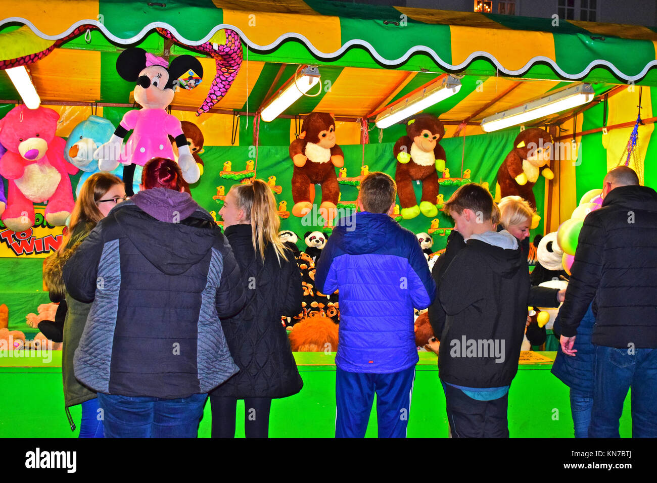 A group of teenagers is attracted to a colourful stall in the Rhiwbina ...
