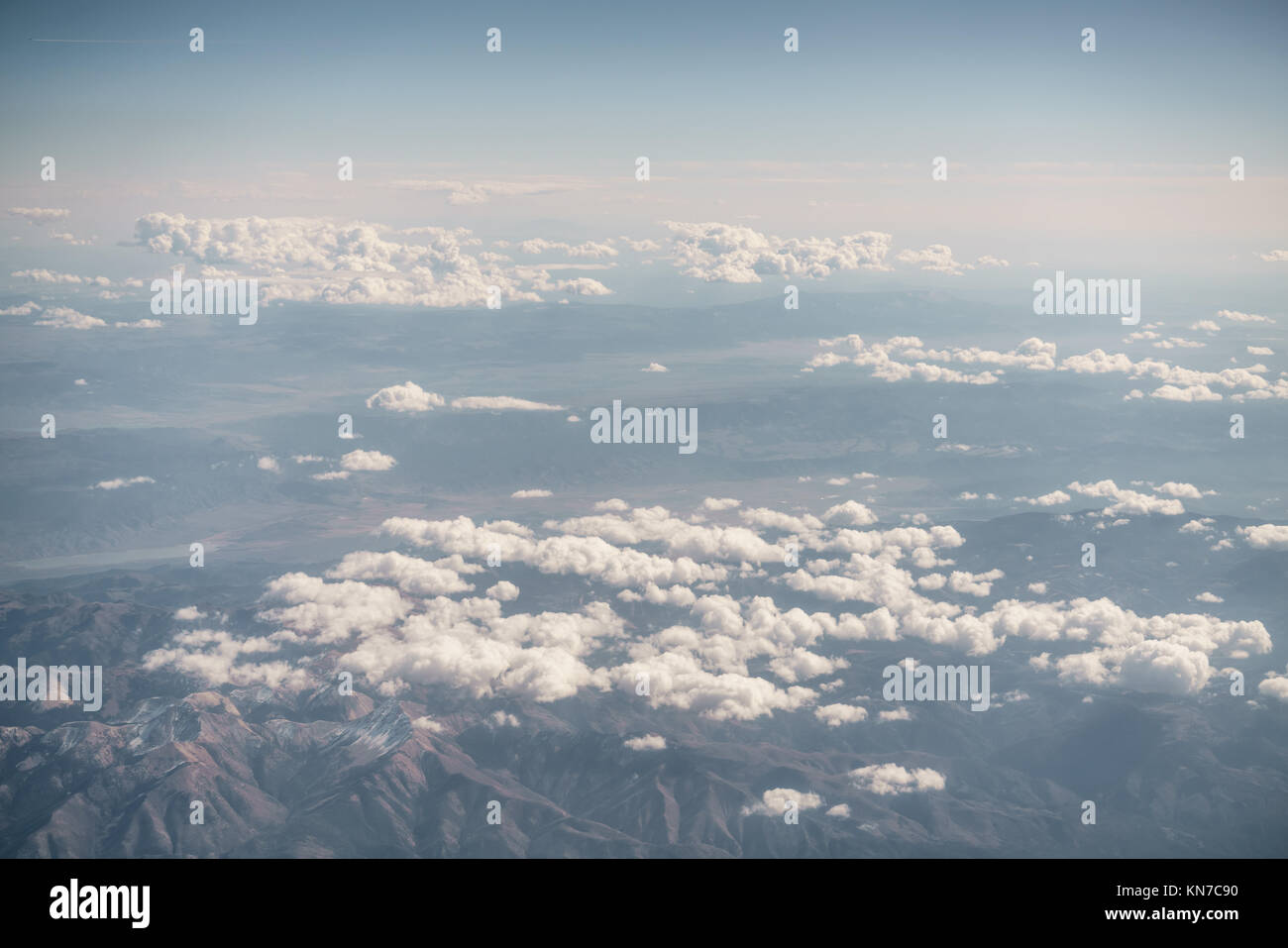 aerial shot from plane flying above the desert in daytime, uhd prores ...