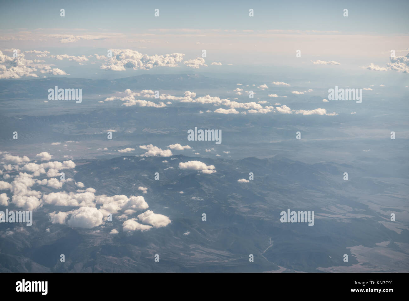 aerial shot from plane flying above the desert in daytime, uhd prores ...