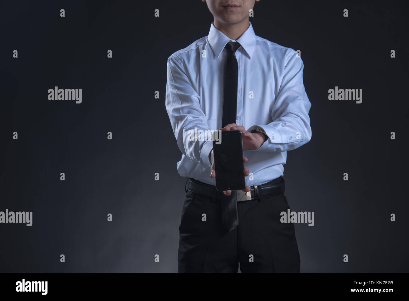 Studio portrait of young man,business concepts Stock Photo - Alamy
