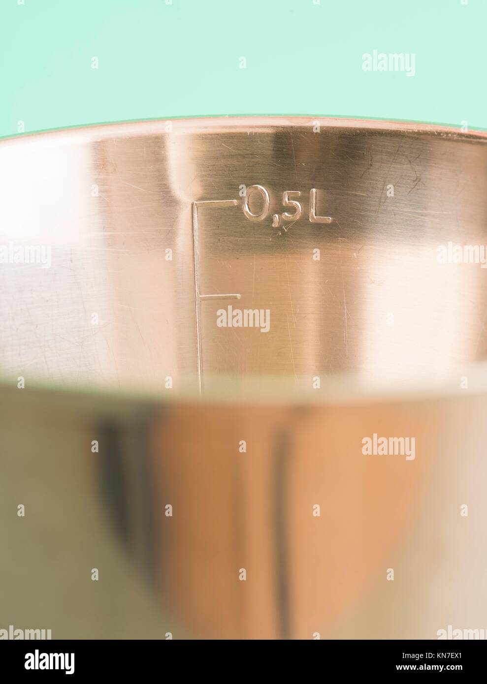 Measure cup detail. Stainless steel kitchen utensil close up Stock ...