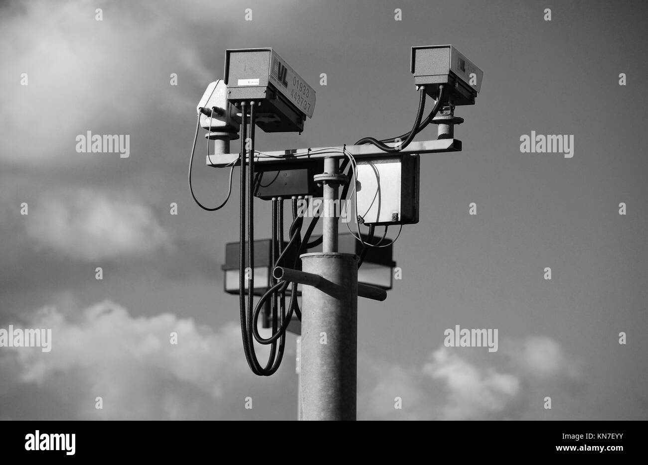 A pair of CCTV cameras on a gantry at Ashford in Kent, England on ...