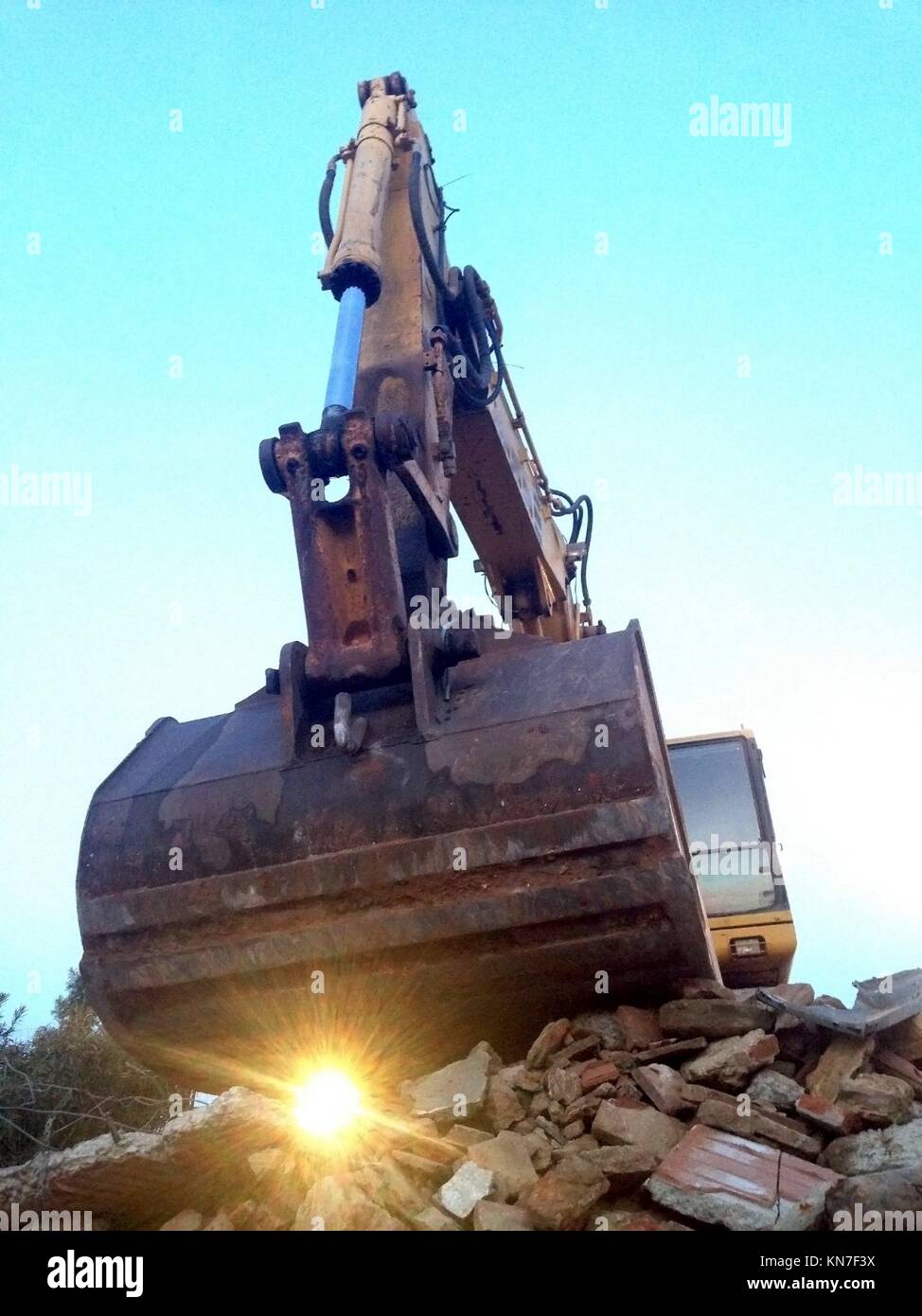 Digger working at landfill site Stock Photo - Alamy