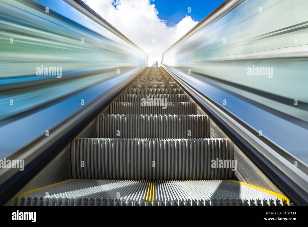 Escalator in an underground station with skyline in background Stock ...