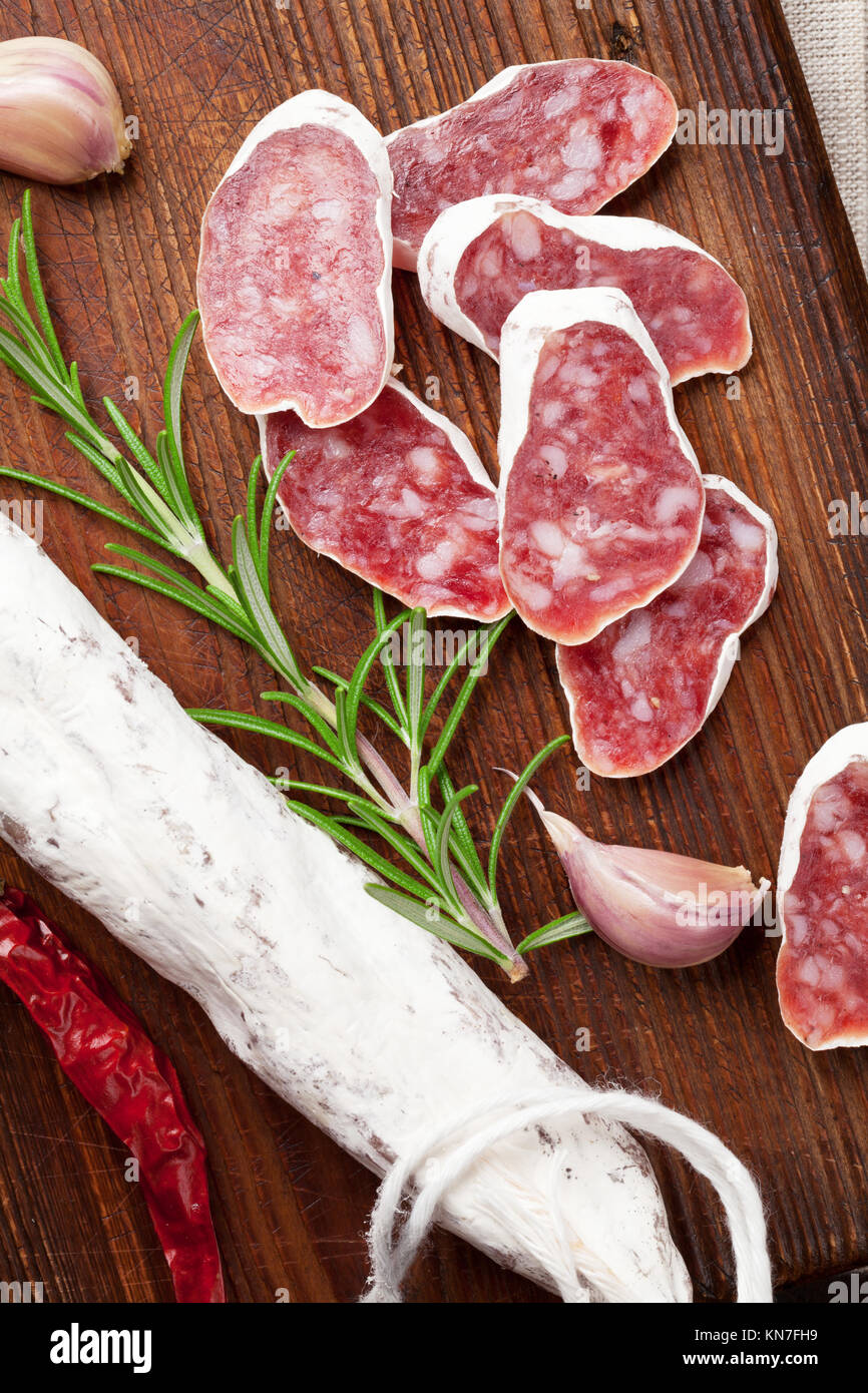 Sliced salami on cutting board. Top view Stock Photo - Alamy