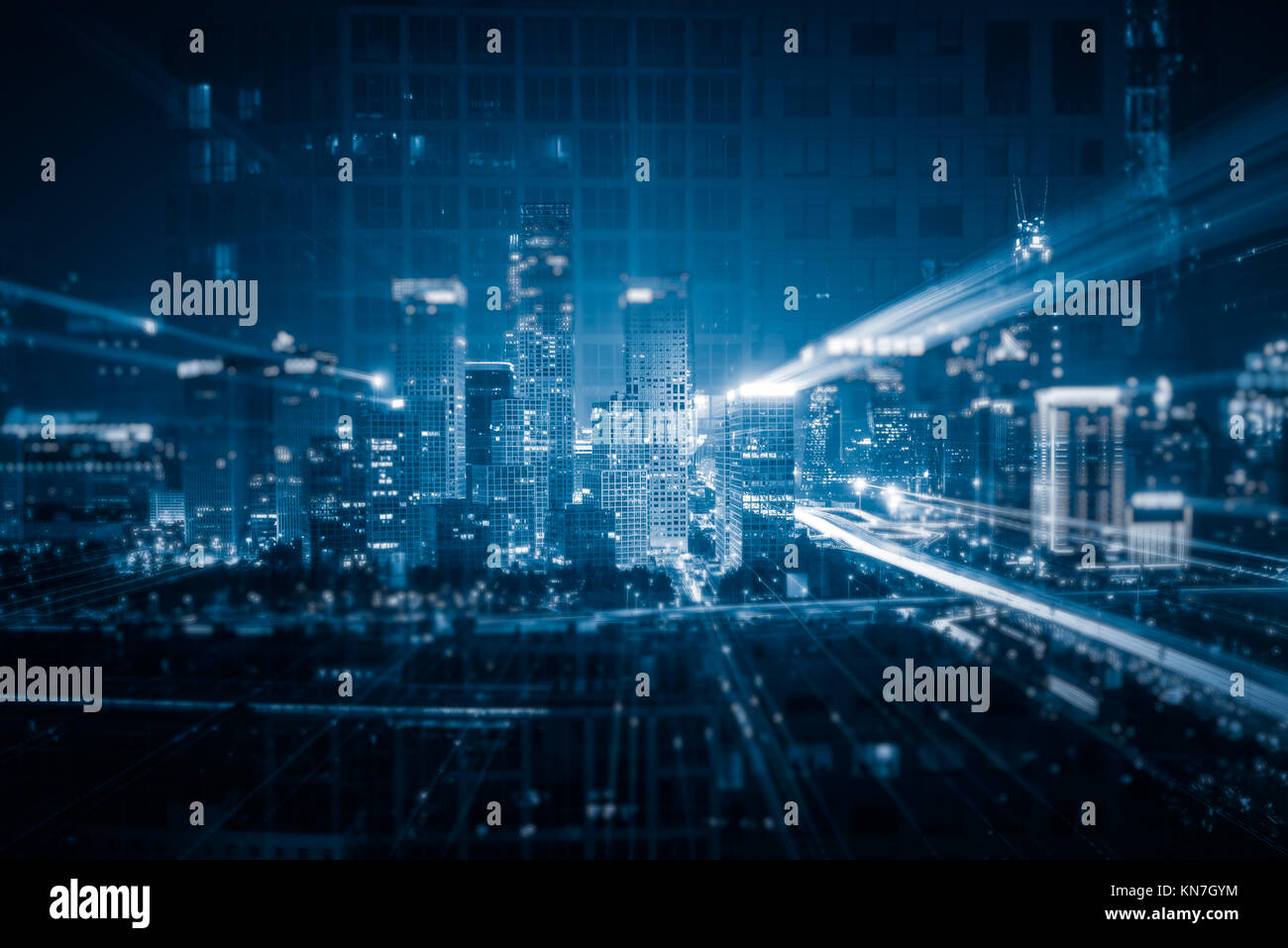 Light trails above buildings at night in China Stock Photo - Alamy