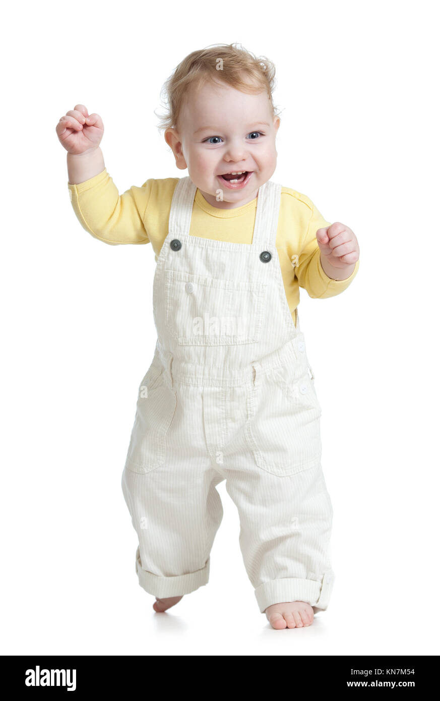 Happy kid making the first step isolated Stock Photo - Alamy