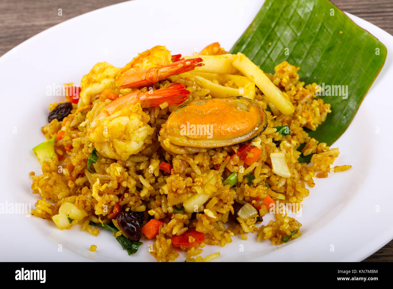 Fried rice with seafood - shrimp, mussel, squid Stock Photo - Alamy