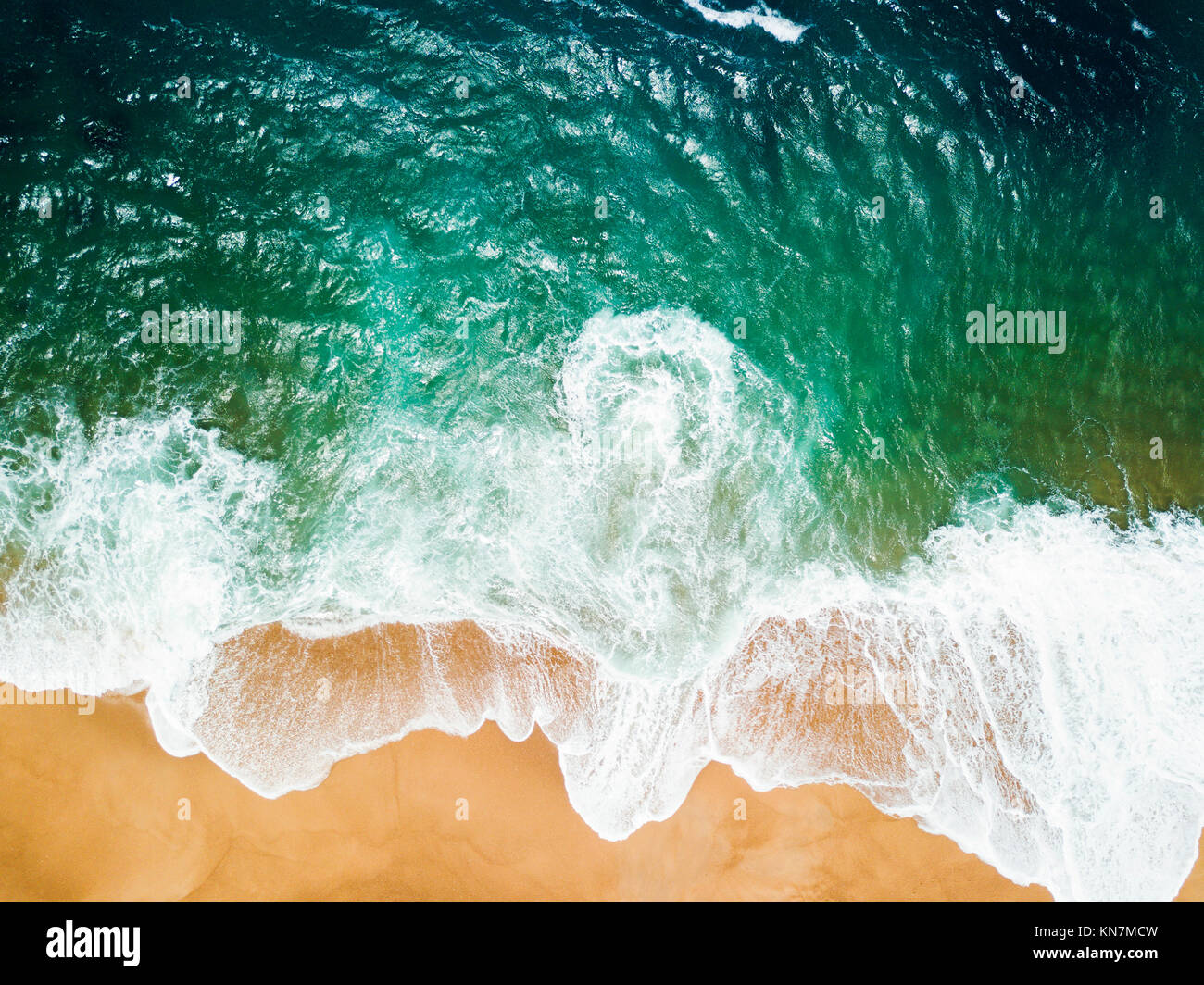 Top view of a deserted beach. The Portuguese coast of the Atlantic ...