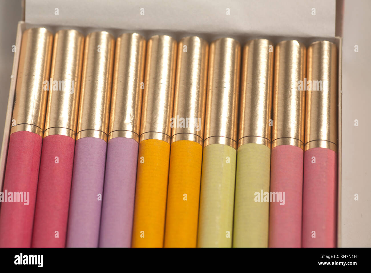 Box of colorful cigarettes close up Stock Photo - Alamy