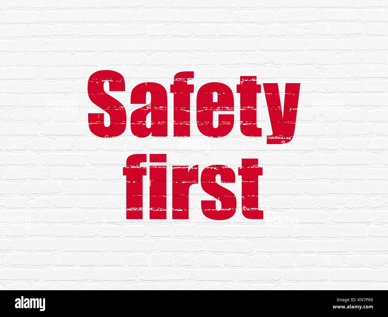 Protection concept: Safety First on wall background Stock Photo - Alamy