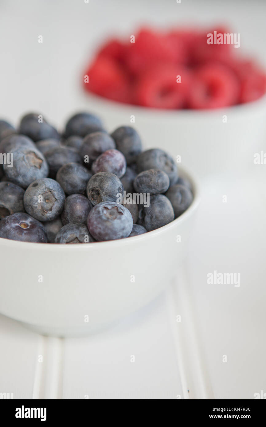 Bowls of blueberries and raspberries Stock Photo - Alamy