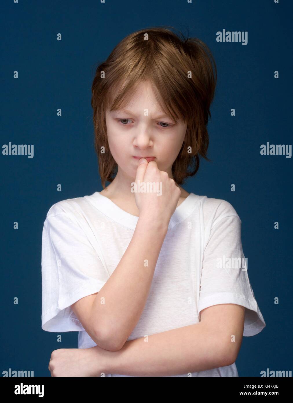 Boy thinking hi-res stock photography and images - Alamy
