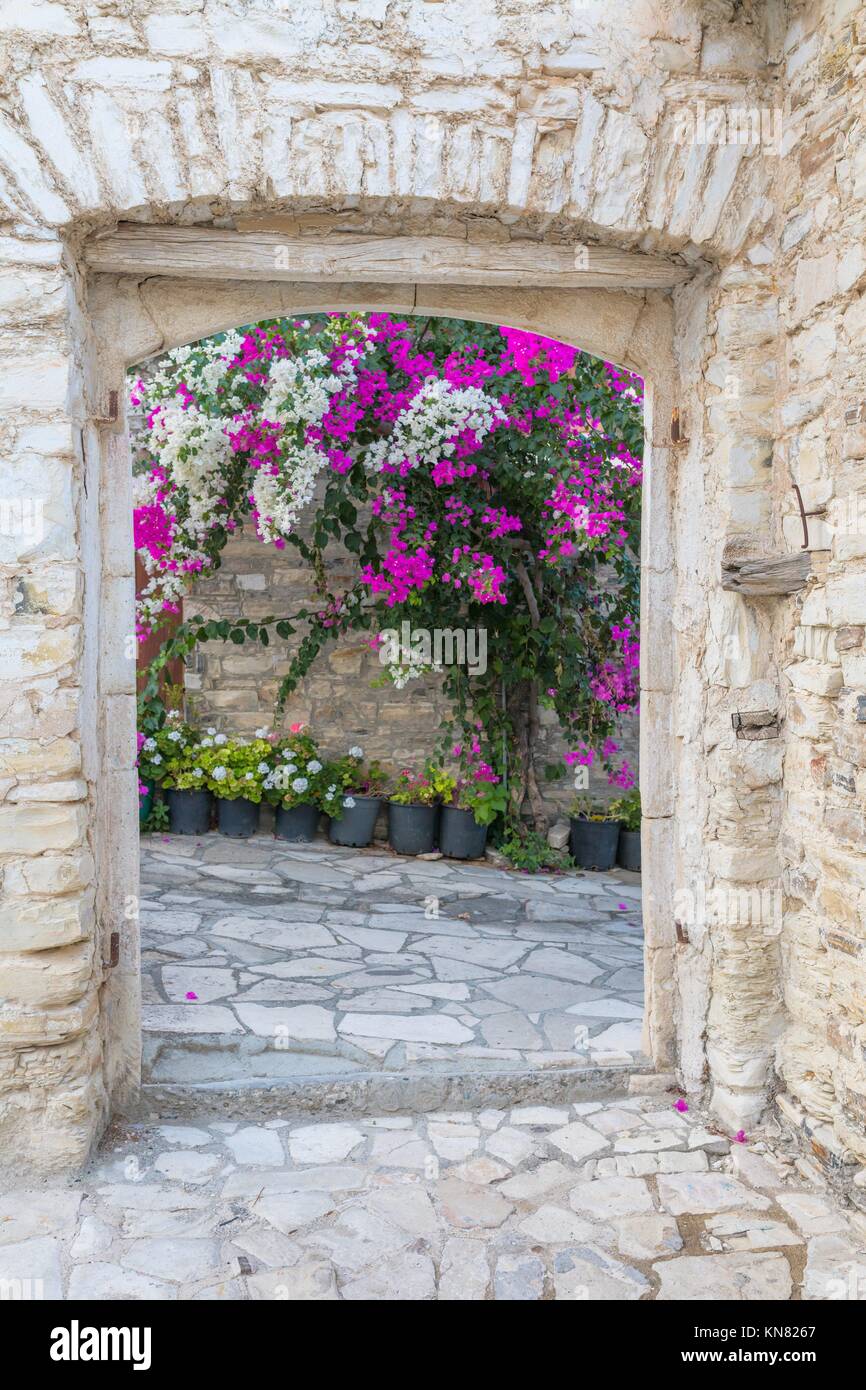 Portal on street in old town with pots of flowers, Lefkara, Cyprus ...