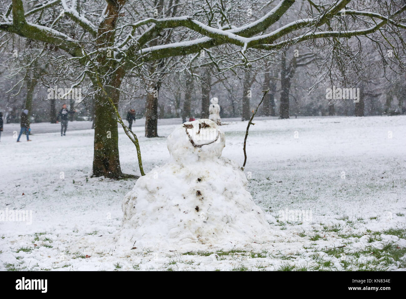 London. UK 10 Dec 2017 - A snowman in Finsbury Park as Londoners wake ...