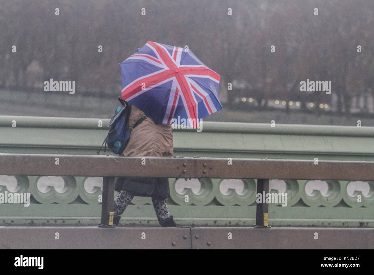 London, UK. 11th Dec, 2017. Pedestrians brave the cold weather with ...