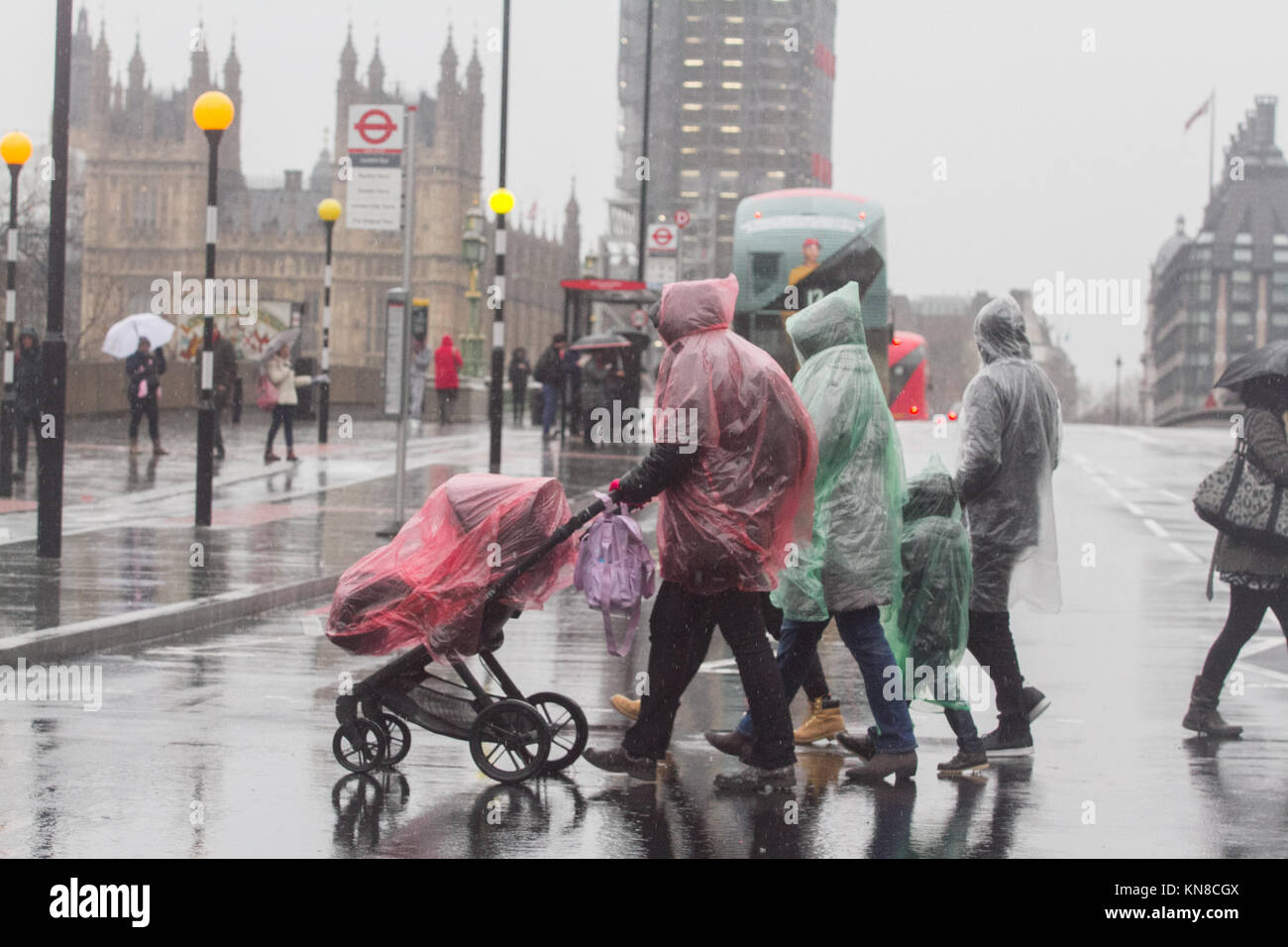 London, UK. 11th Dec, 2017. Pedestrians struggle to cope with the ...