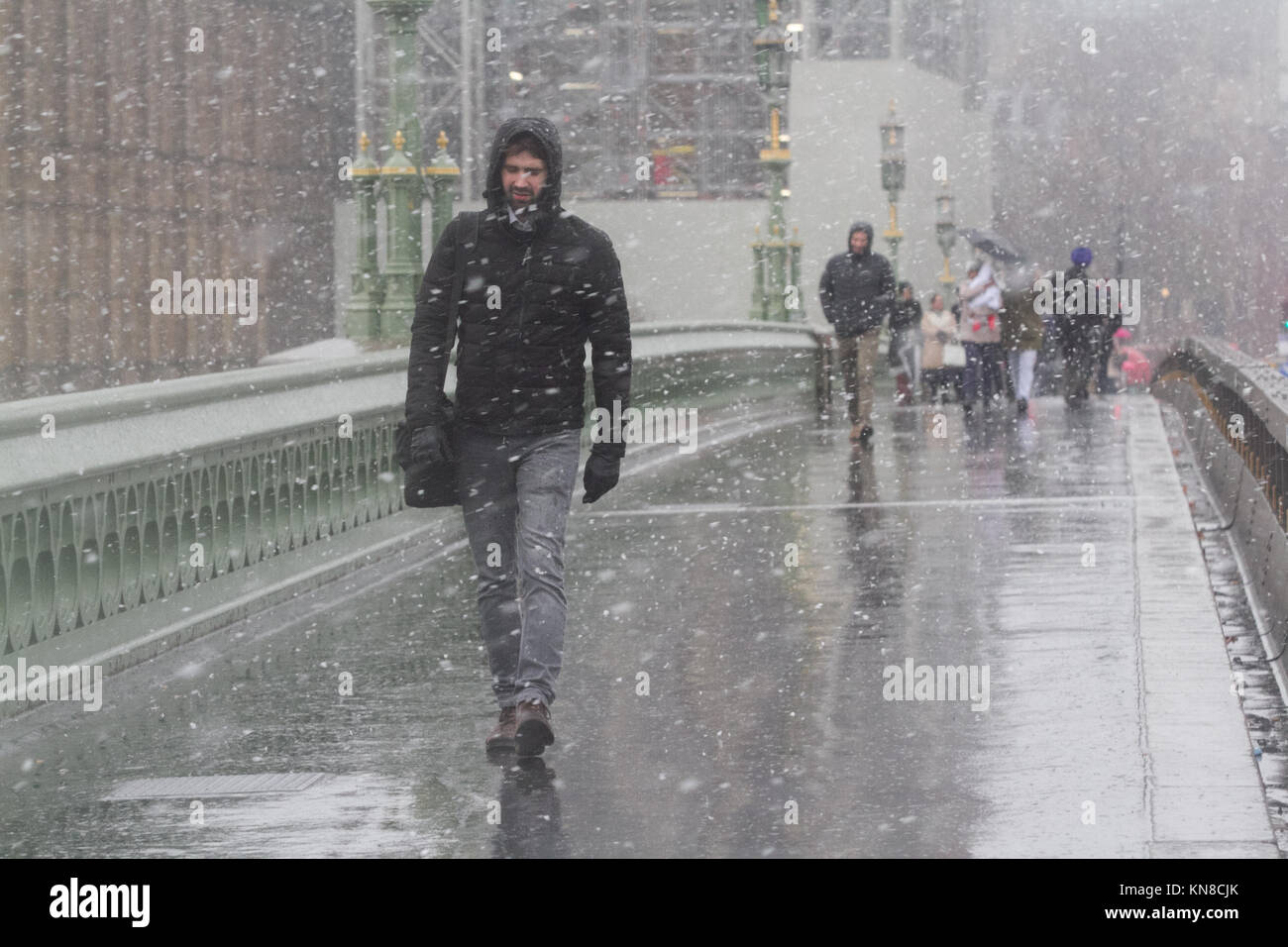 London, UK. 11th Dec, 2017. Pedestrians struggle to cope with the ...