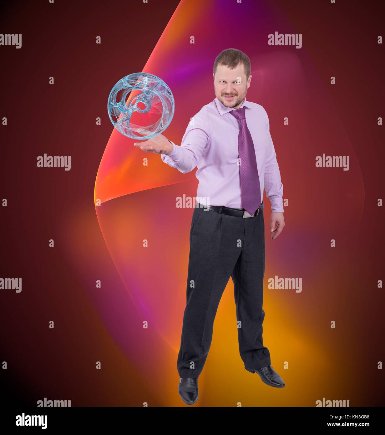 Businessman holding his right hand out palm up with sphere on abstract ...