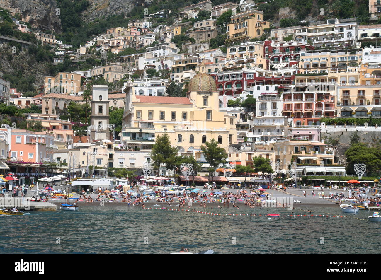 Positano beach sunbathing hi-res stock photography and images - Alamy