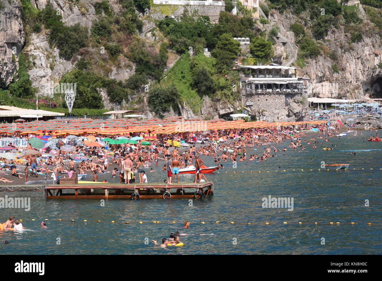 Positano beach sunbathing hi-res stock photography and images - Alamy