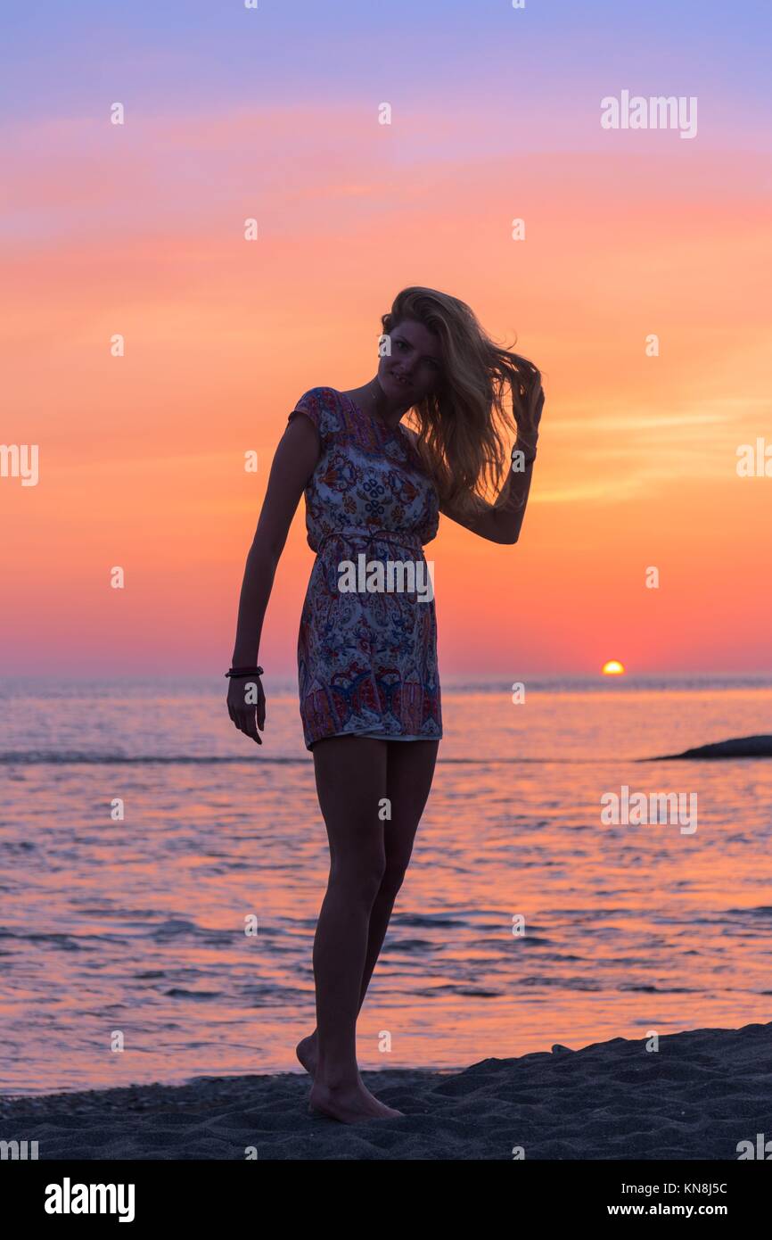 Beautiful young woman on the beach hi-res stock photography and images ...
