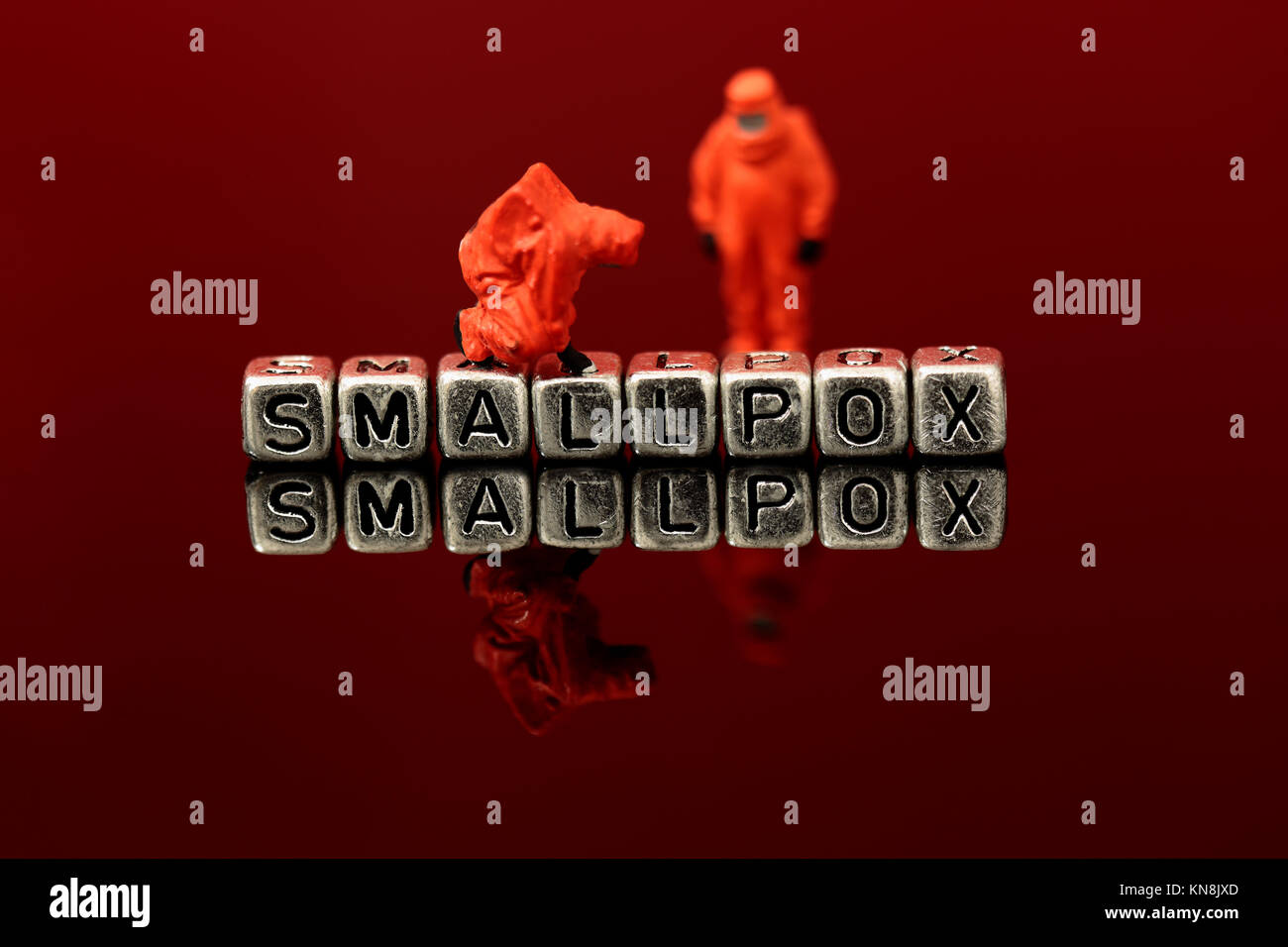 Smallpox on beads with miniature scale model chemical team Stock Photo ...